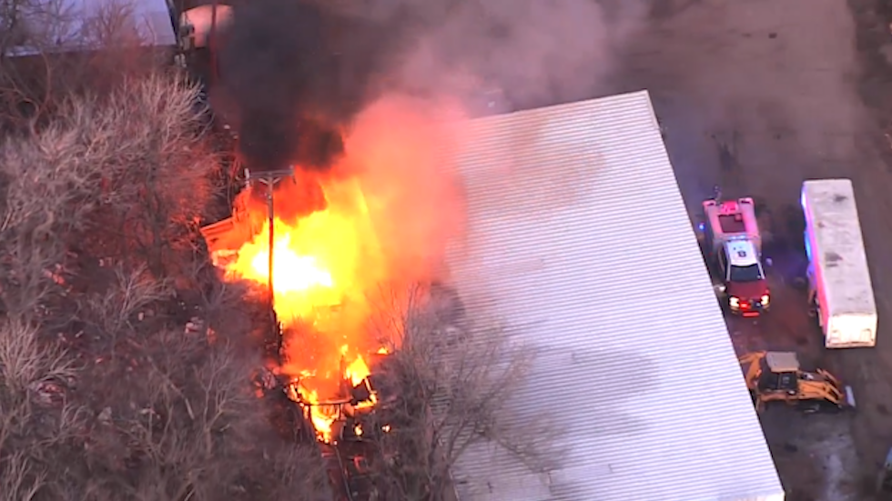 WATCH: Sky 5 shows large flames roaring outside SW OKC structure