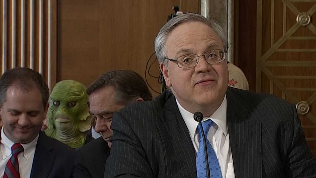Protesters dressed as swamp creatures crash Senate hearing