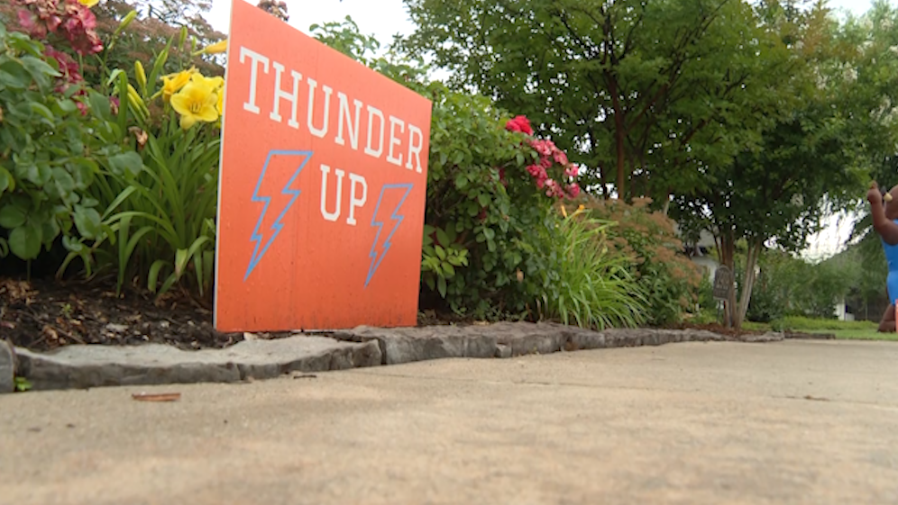 OKC woman's homemade signs bring Thunder spirit to NBA Playoffs