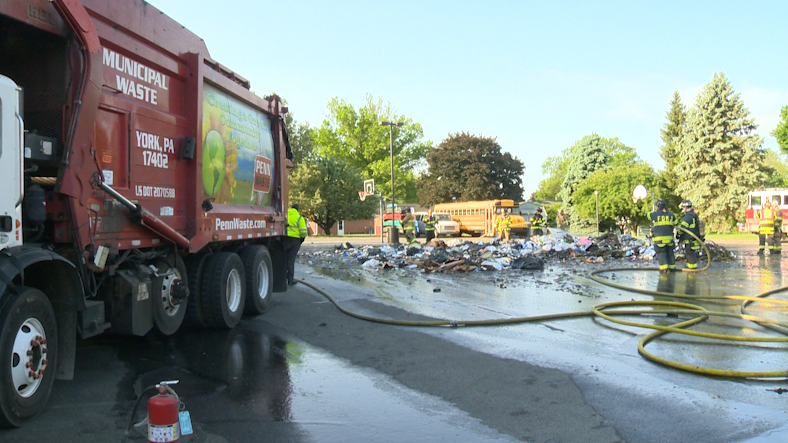 Truck dumps burning load of trash in Lancaster County