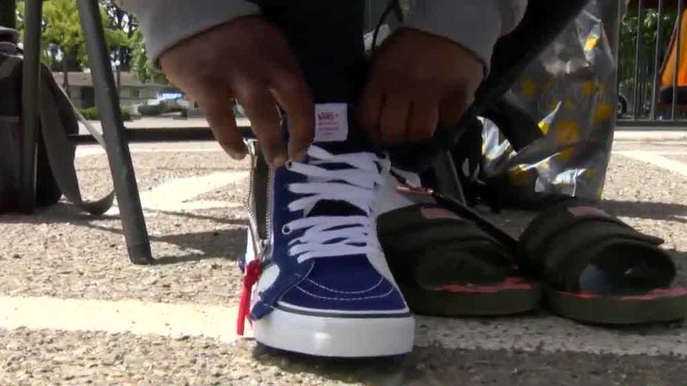 Project Community: Group hands out new shoes to homeless people in San ...