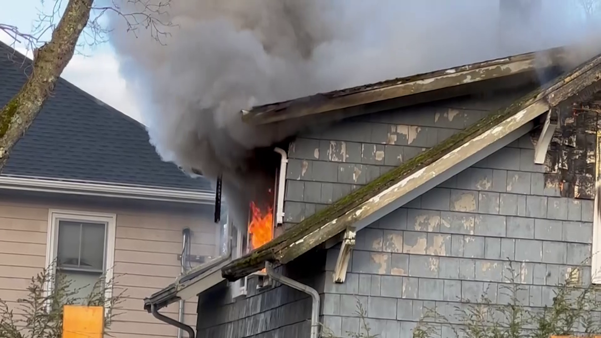 Woman injured in Beverly house fire