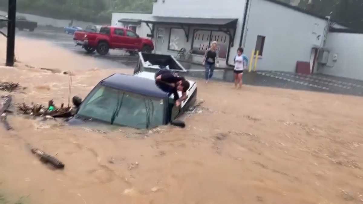 Tattoo shop employees help save man stuck in floodwaters