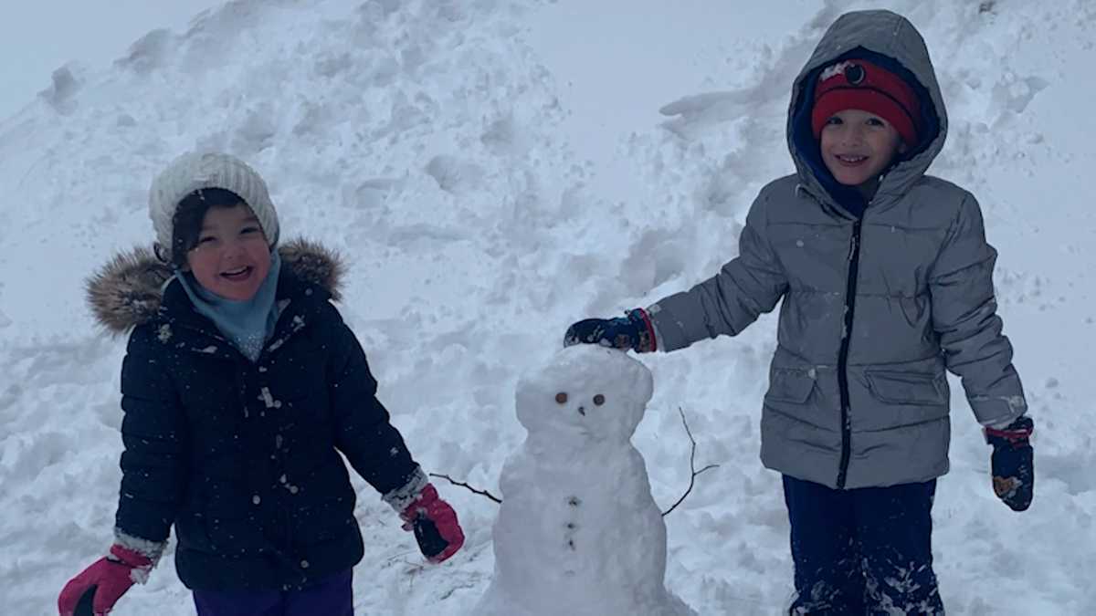 Kids build snowman, spread joy at senior facility