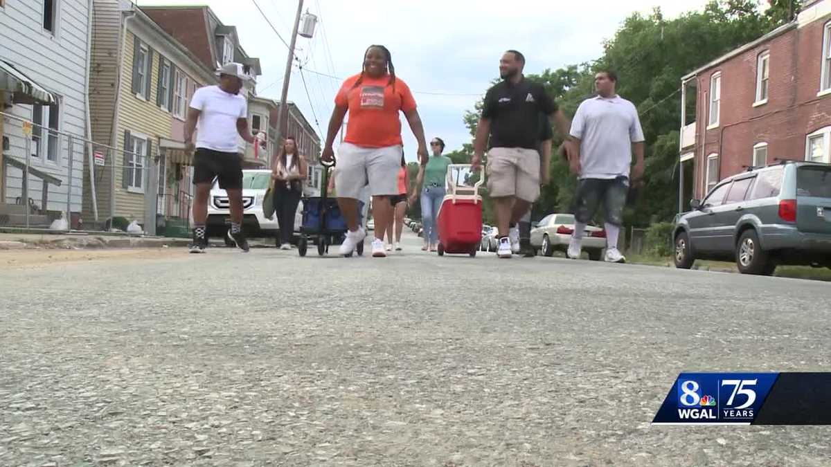 York hosts community walk in wake of shooting that wounded 4 young women