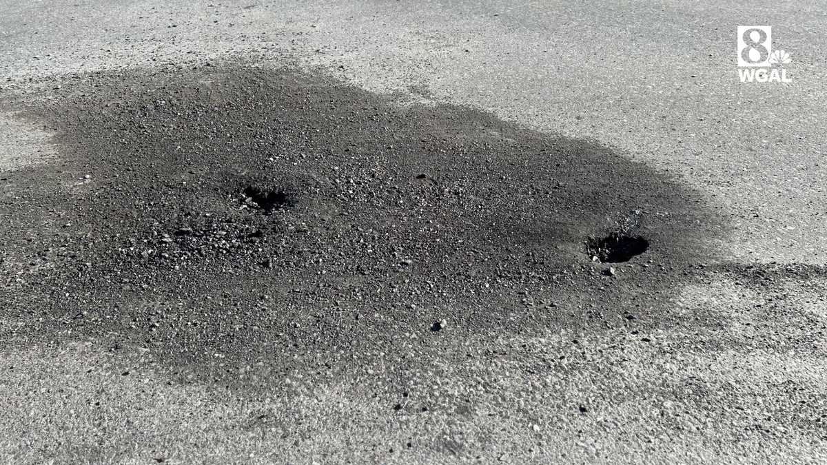 Downed power lines scorch road, burn holes into pavement at York County ...